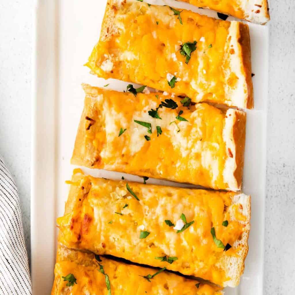 The BEST Cheesy Garlic Bread - The Cheese Knees